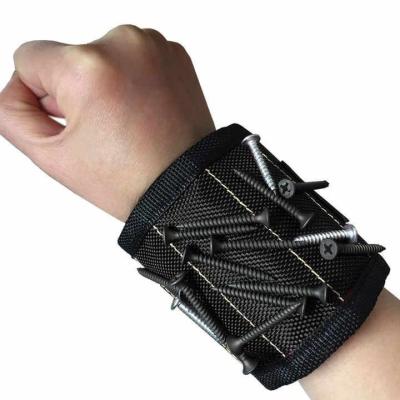 Cina Fascia di polso regolabile magneticamente con magneti forti per assorbire viti e trapano in vendita