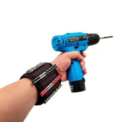 Cina Braccialetto magnetico con cinghia del pollice Magneti forti Tenere unghie Foratura Bit Noci Conservazione in vendita