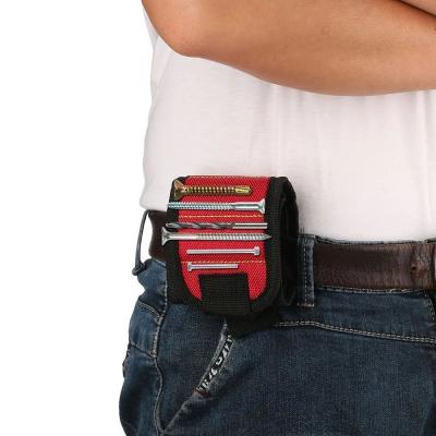 Cina Braccialetto magnetico Borsa per attrezzi portatile Magnete cintura elettricista viti Chiodi per foriere in vendita