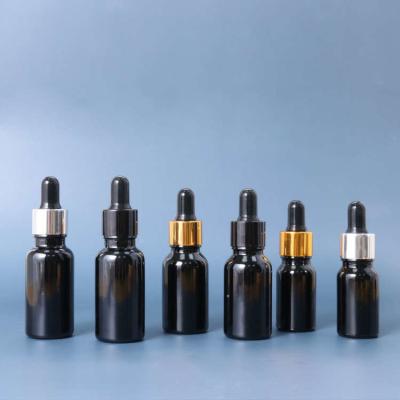 Cina Bottiglie di olio essenziale nere ultraleggere, bottiglia riutilizzabile del contagoccia del nero 15ml in vendita