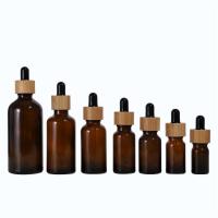 China 10ml Glass Bottle with Bamboo Dropper for Cosmetic Packaging Custom Size for sale