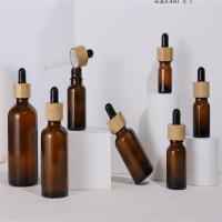 China 10ml Glass Bottle with Bamboo Dropper for Cosmetic Packaging Custom Size for sale