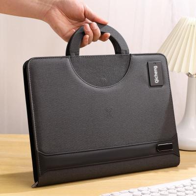 China Multifunctional Business Portfolio Folder A4 Leather Notebook LED USB Wireless Charging for sale