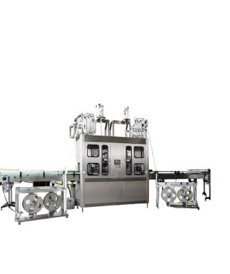 China Double Head Auto Shrinking Sleeve Labeling Machine For Large Scale Manufacturing for sale