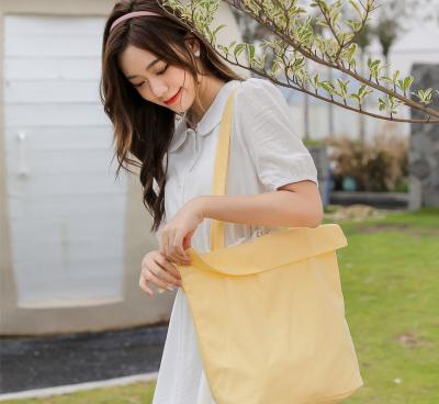 Cina Vintage Hand Canvas Good Quality Folded Bestselling Custom Drawstring Bag Excellent For Women in vendita