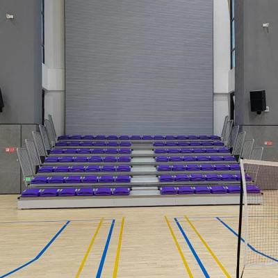 China Steel Frame Retractable Bleacher Seating with Floor Mounted Seat for sale