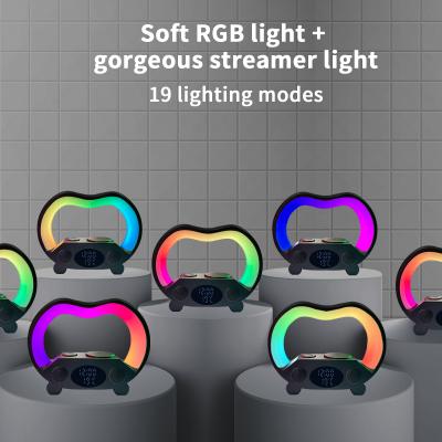 China Multifunction ABS Smart Bluetooth Speaker With Wireless Charger Speaker Color Light for sale