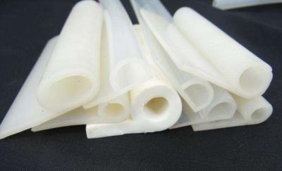 China Pure Extruded Silicone Rubber Profiles , Silicone Door Weatherstripping for sale