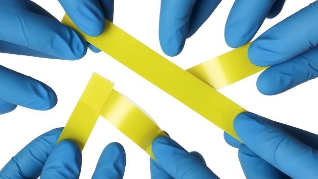 Sealant Tape product sample showing application on industrial equipment