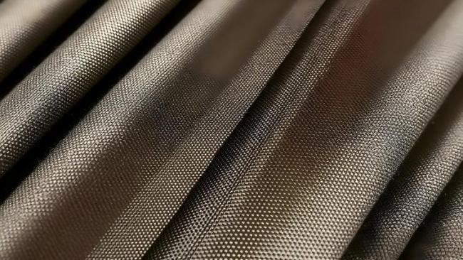 Close-up view of basalt fiber woven fabric showing texture and weave pattern