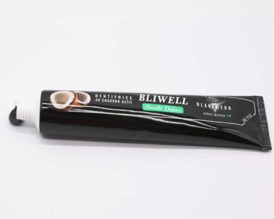 Cina Denti delicati naturali di pulizia del nero della noce di cocco del carbone attivo che imbiancano dentifricio in pasta in vendita