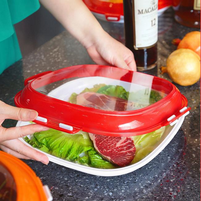 Close-up of food tray with stretched lid