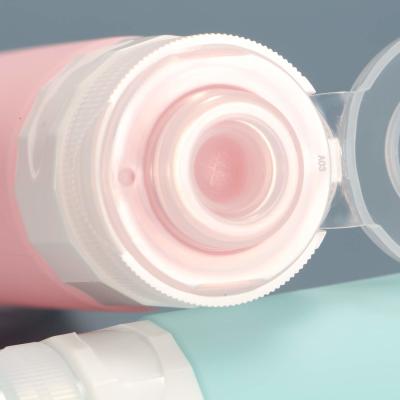 中国 再利用可能なシリコントラベルボトルセット 58ml 吊り下げ穴付き 販売のため