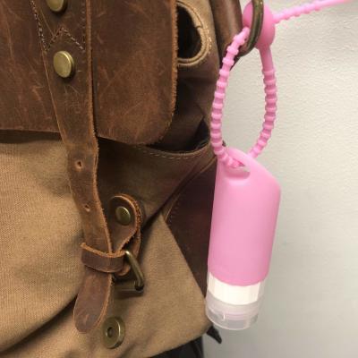 中国 再利用可能なシリコントラベルボトルセット 58ml 吊り下げ穴付き 販売のため