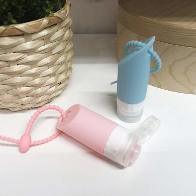 中国 再利用可能なシリコントラベルボトルセット 58ml 吊り下げ穴付き 販売のため