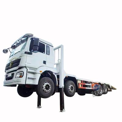 China Shacman Export Model Front Lift 30 Tons Flatbed Truck   Self-unload Truck     Flatbed Transporter for sale