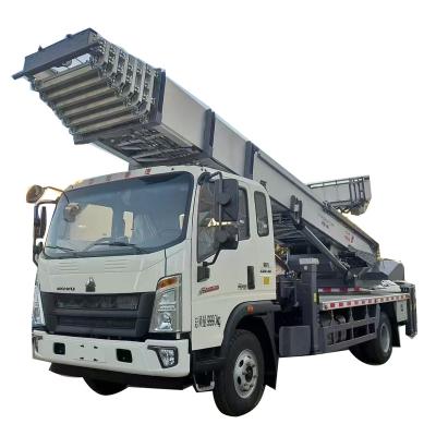 China Customized New Type HOWO 45Meters  51 Meters Ladder Aerial Platform Truck With 6 Hydraulic Leg Remote Control Systern for sale