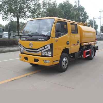 Cina Giallo doppia fila 4000-5000 litri Green Spraying Truck Strada Sprinkle Water Feeder Bowser acqua in vendita