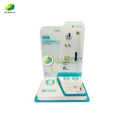 China Acrylic Plastic Display Stands Customized Retail Countertop Display Supermarket Plastic Shelving Display For Toothbrush for sale