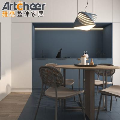 China Custom Design Luxury White PVC Modular Kitchen Cabinets with Solid Surface Countertop for sale