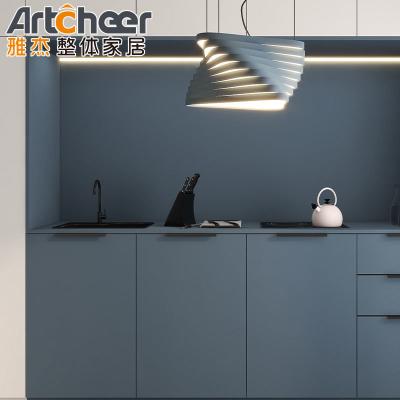 China Custom Design Luxury White PVC Modular Kitchen Cabinets with Solid Surface Countertop for sale