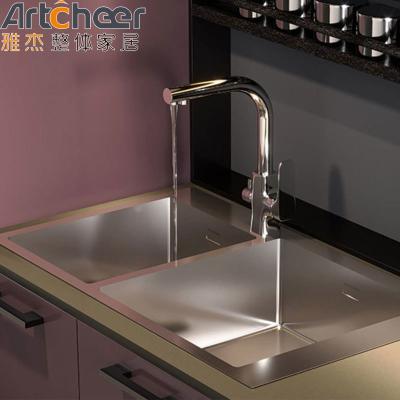 中国 Handless Door Soft Close L Shape Kitchen Cabinet With Solid Surface Countertop Modern Design 販売のため