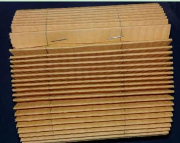 China Orange Yellow Filter Material Full Glue Free From Curing Eco Oil Filter Paper for sale