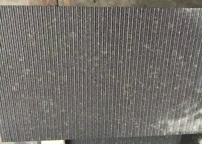 Cina Il ciottolo basale nero che pavimenta i mattoni, abbellisce le pietre per lastricati del granito nero in vendita