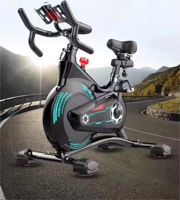 China Adjustable Spinning Bike Magnetic Resistance Exercise Bike Gym Equipment Home Pedal Dynamic Exercise Bike for sale