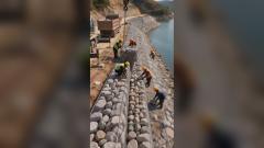 No more rigid concrete revetment. Gabion cages let water & soil circulate, restore natural ecology.