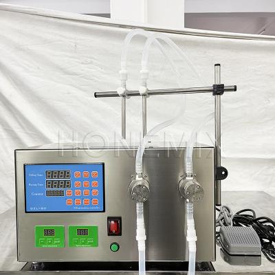 Cina Macchina di riempimento di bottiglie piccole da scrivania con doppia testa in vendita