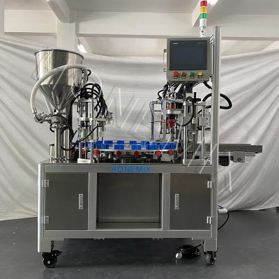 Cina Servo rotativo liquido di crema di riempimento macchina di tappo automatico due teste toner in vendita