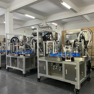 Cina Servo rotativo liquido di crema di riempimento macchina di tappo automatico due teste toner in vendita