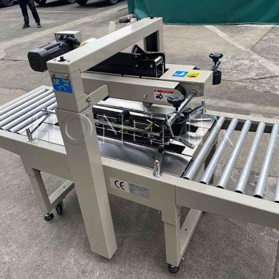 Cina 220V / 50HZ macchina di imballaggio automatico 12mm cartone scatola sigillante adesivo nastro in vendita