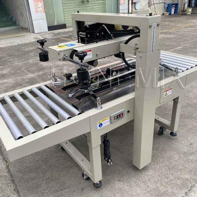 Cina 220V / 50HZ macchina di imballaggio automatico 12mm cartone scatola sigillante adesivo nastro in vendita