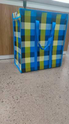 China Waterproof PP Check Bag with Top Handle and Adjustable Strap for sale