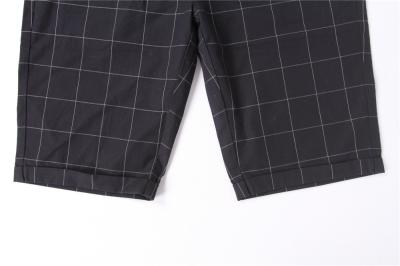 中国 100%の綿のチノの格子縞はスポーツのための用品類の人海軍黒をショートさせる 販売のため