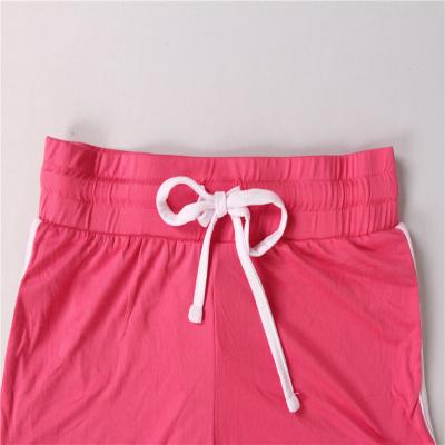 中国 ニットのピンクの女性の引きは92%ポリエステル8%スパンデックスをショートさせる 販売のため