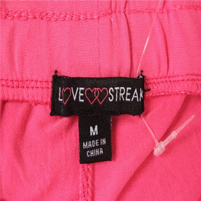 中国 ニットのピンクの女性の引きは92%ポリエステル8%スパンデックスをショートさせる 販売のため