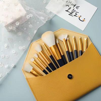 China Wood Handle Makeup Brush Set 12 Concealer Blush Brow Lip Nose Shadow Eye Shadow Brush for sale