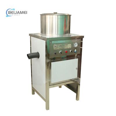 China Multi Functional Garlic Peeler Machine Professional Onion And Nut Skin Removing Equipment With High Output for sale