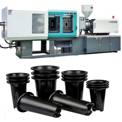China Hydraulic/Pneumatic Mould Ejection System Aotai Injection Molding Machine with Leakage/Stress Testing for sale