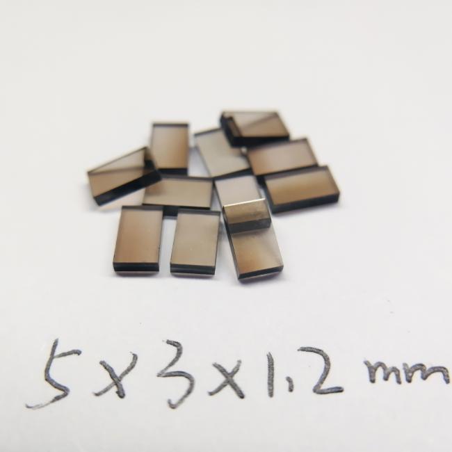 5x3x1.2mm Mono CVD diamond sample showing rectangular shape and brownish color