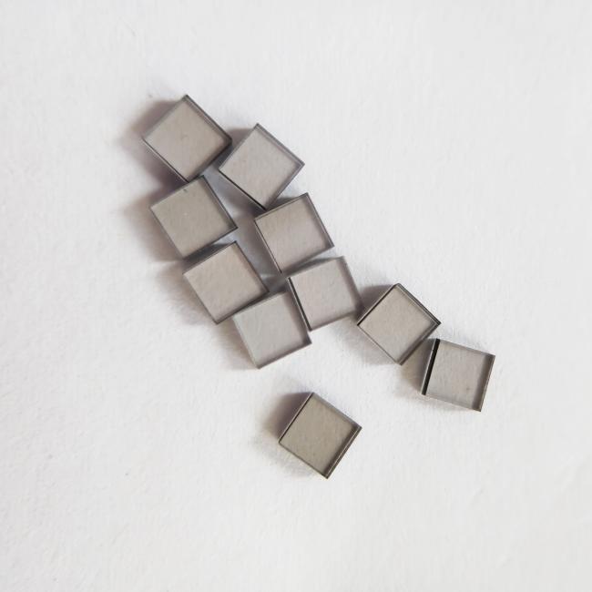Close-up view of monocrystaline CVD diamond with laser cut edges