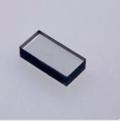 Mono CVD diamond sample showing rectangular shape and brownish color