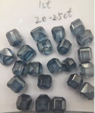 Blue rough diamond under professional lighting
