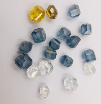 Blue rough diamond sample showing natural texture and color