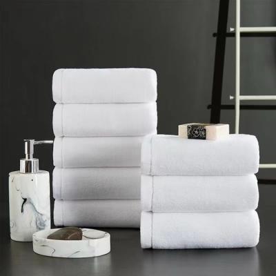China Luxury White Hotel Towels 100% Cotton Washable Plain Bath Towel for sale