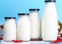 China PLC Control 6000BPH 500ML Automatic Milk Filling Machine Gravity Filling 380V for sale
