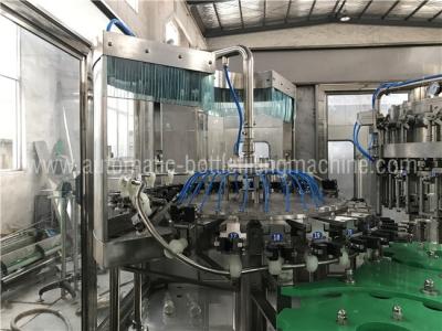 Cina La macchina di rifornimento liquida automatica piena, la birra della bottiglia di vetro/ha carbonatato la macchina di rifornimento della bevanda in vendita
